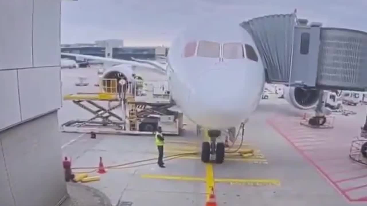 Plane's nose gear collapses while parked at gate at Frankfurt Airport