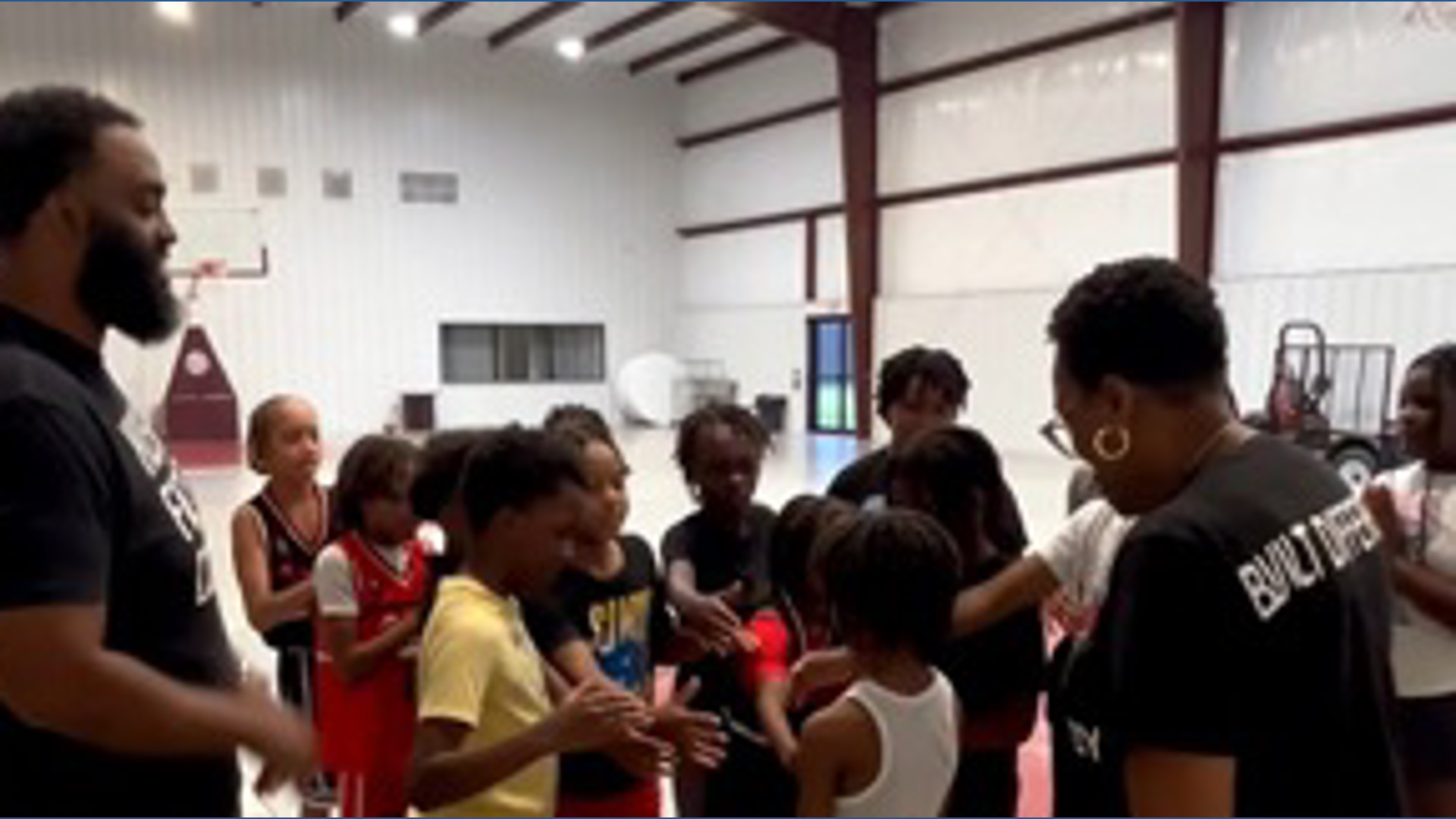 Local AAU basketball team raises funds