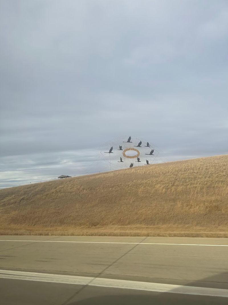 A flock of strange scrap metal geese stand frozen on a North Dakota prairie