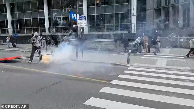 Riot breaks out in Brussels as student protesters rampage through ...