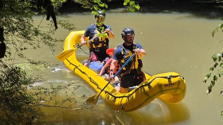 Roswell fire crews rescue a child along Vickery Creek