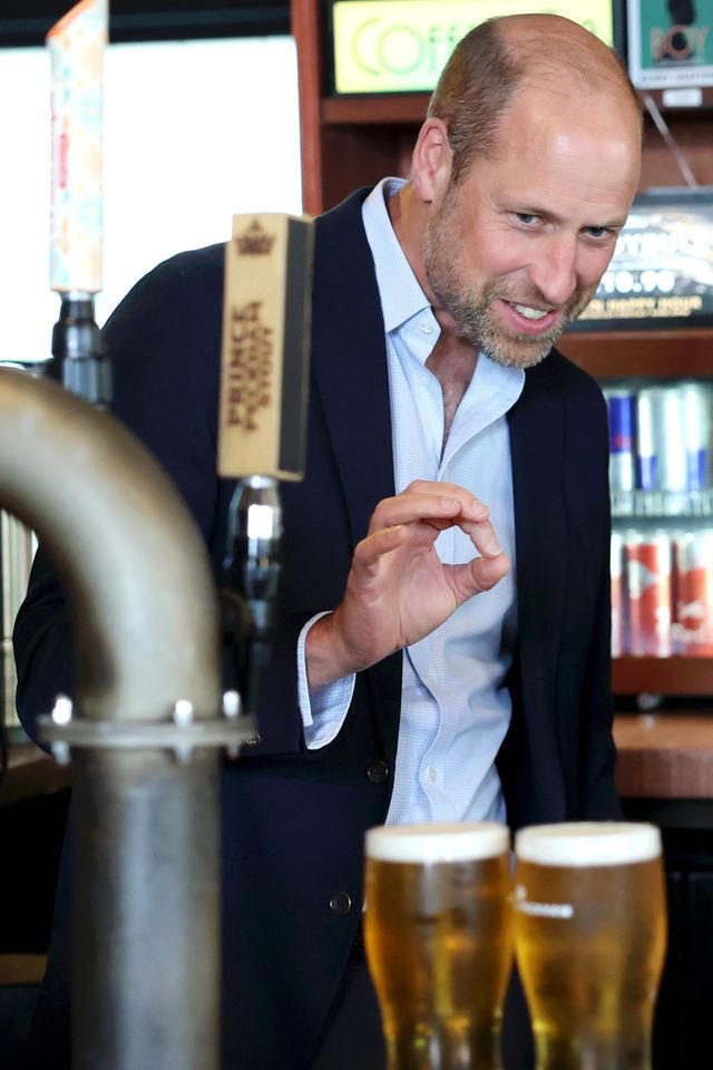 Prince William makes a surprise visit to a local pub and gets behind ...