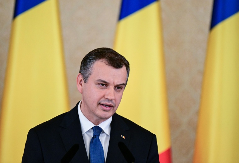 Romanian president nominates EU deputy Tomac as PM to end deadlock