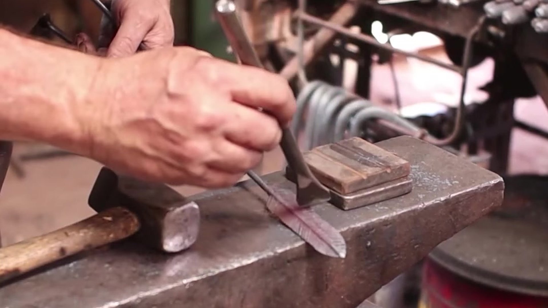 Repurposing old scrap iron by hand