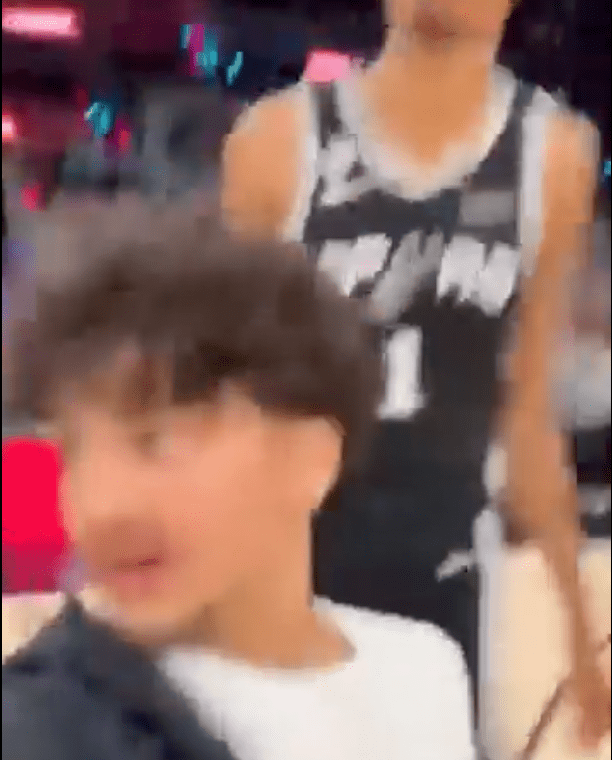 New angle shows fan storming court for selfie with smiling Victor ...