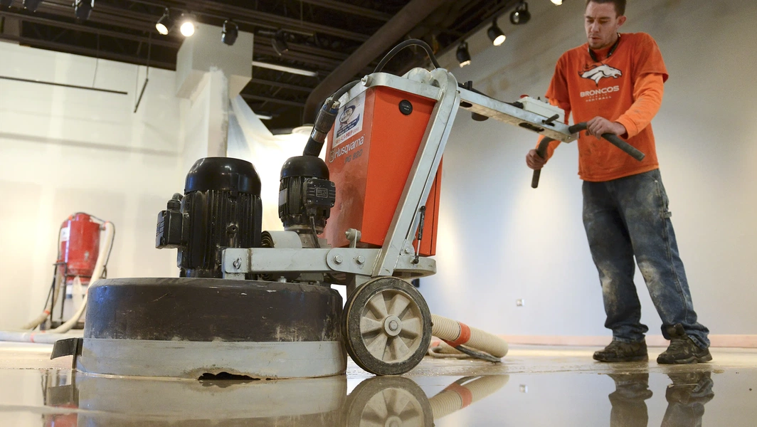 Methods for removing paint from concrete floors