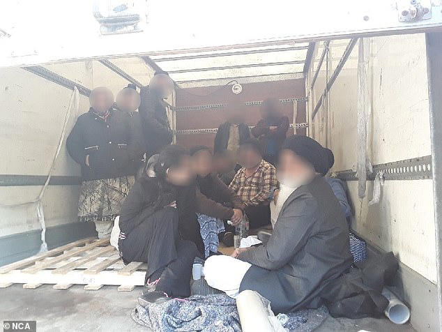 Moment police find Afghan migrants in lorry in people smuggling trip ...