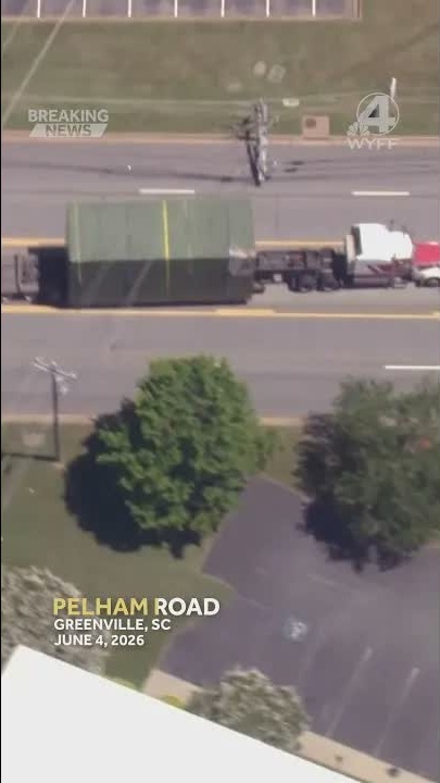 Oversized load strikes power lines on Pelham Road
