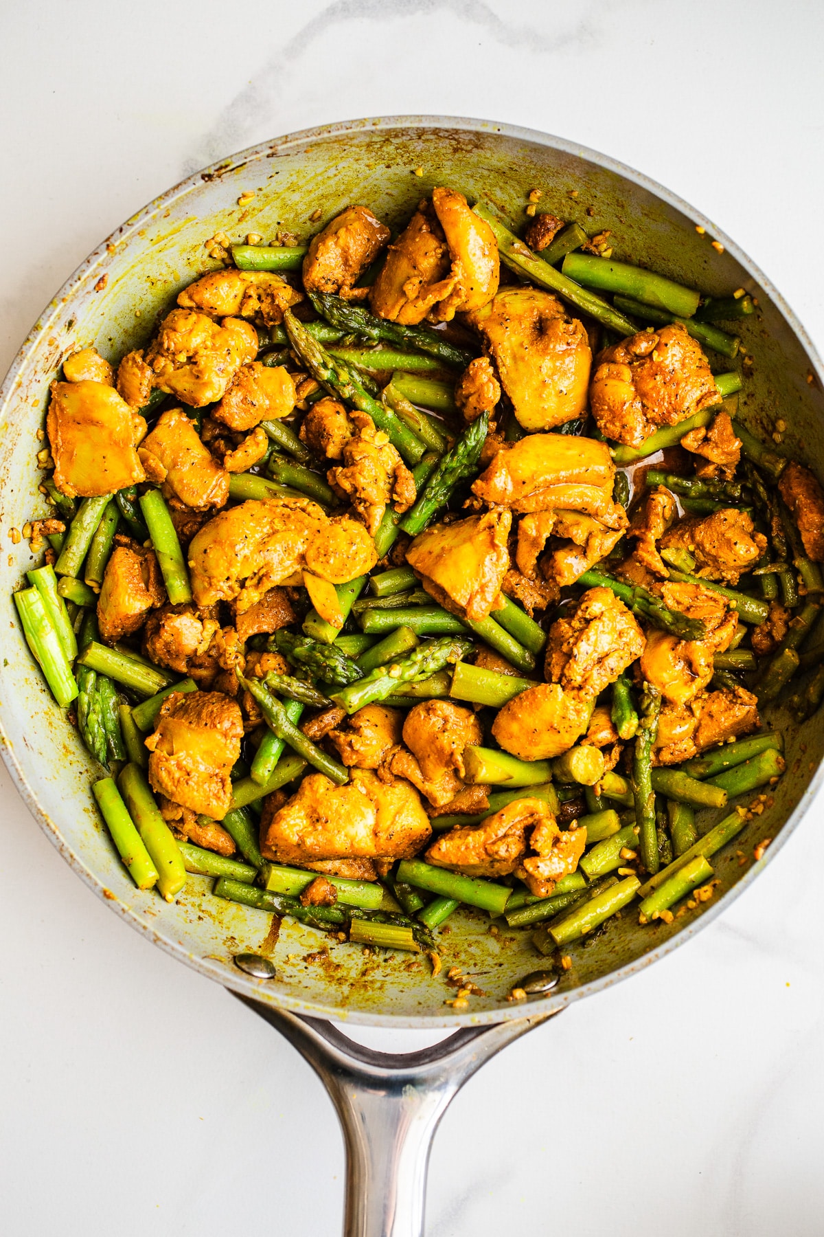 Turmeric black pepper chicken with asparagus