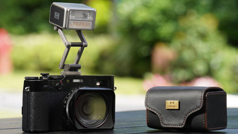 Tiny camera flashes are unflattering. This flash weighs less than a ...