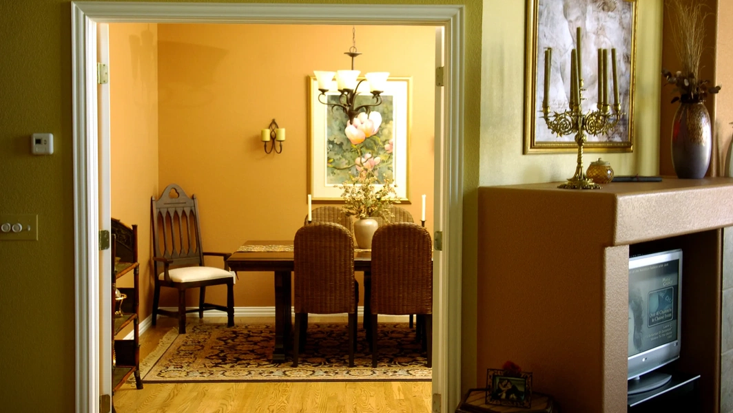 Designers spotlight statement lighting and warm whites in home trends