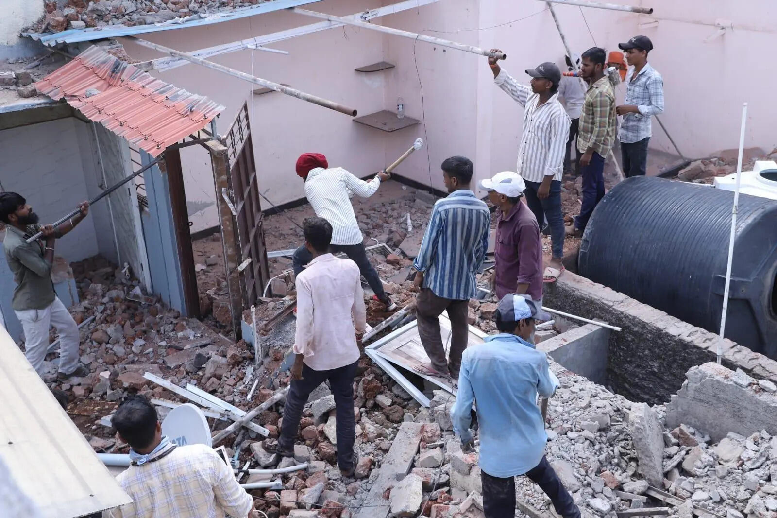 PCMC demolishes illegal residential structure linked to hooch tragedy ...