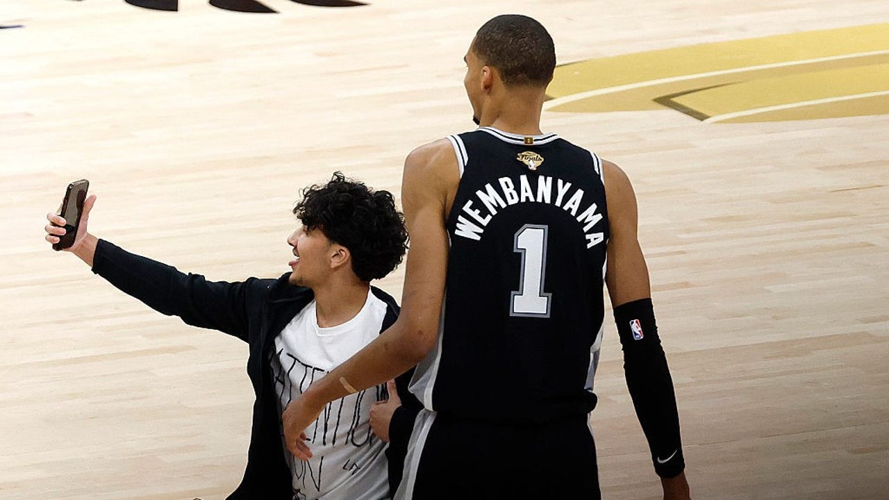 NBA bans 2 fans for life after man rushes court during Finals Game 1
