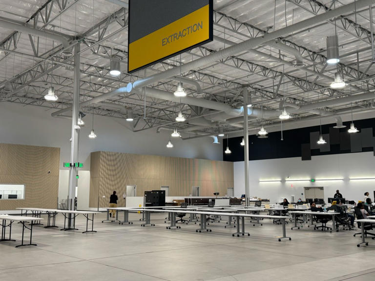 Inside LA County election vote-counting facility with rows of empty ...