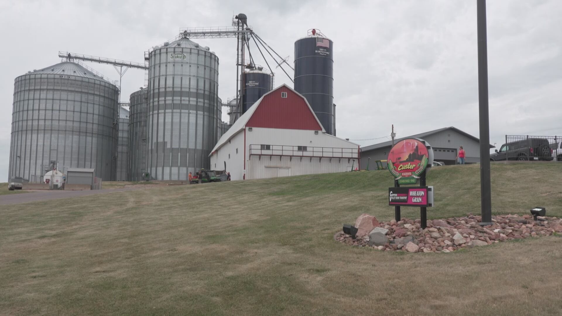 Protestors gather outside Custer Farms