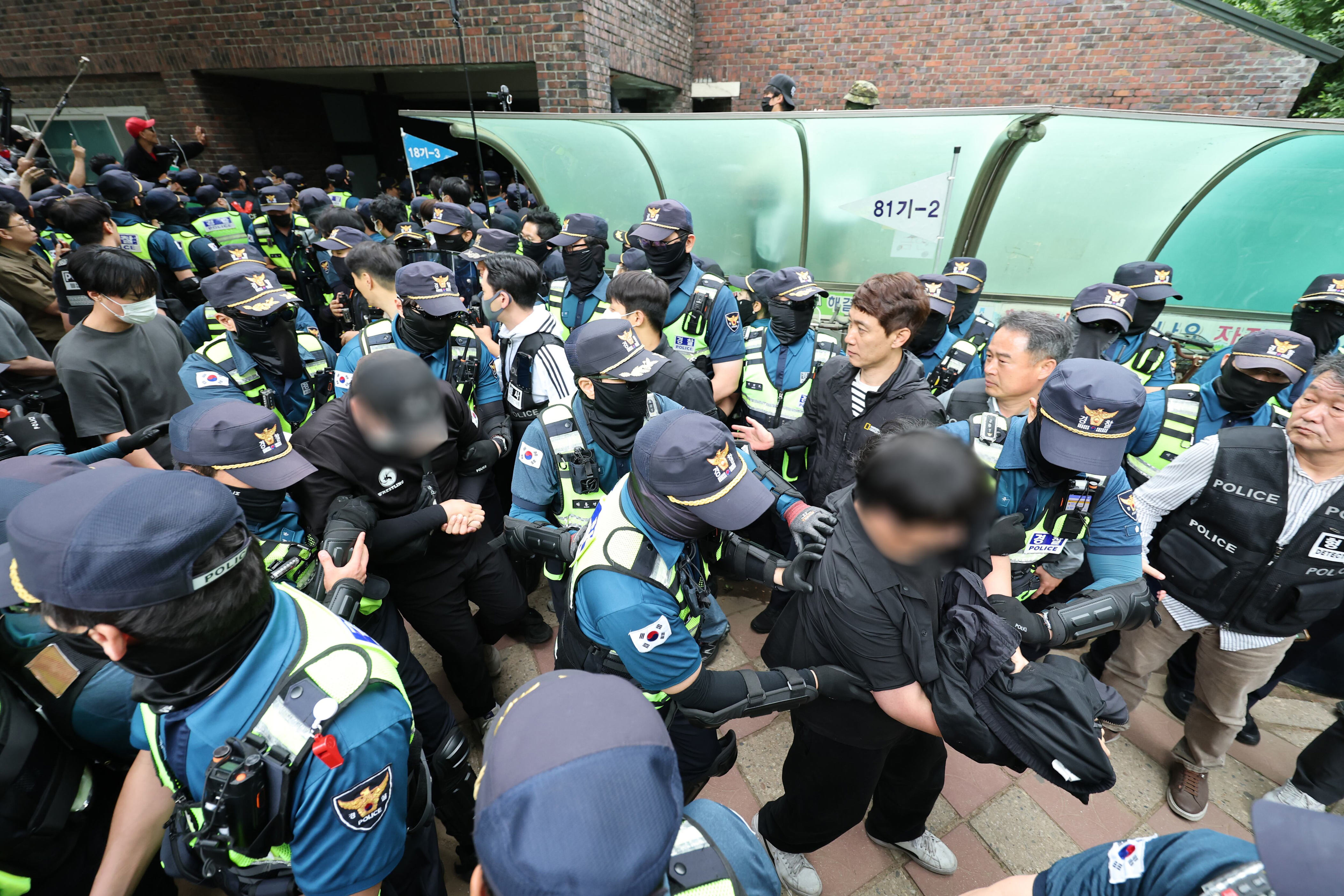 Police secure ballot boxes after 35-hour standoff at Seoul polling station