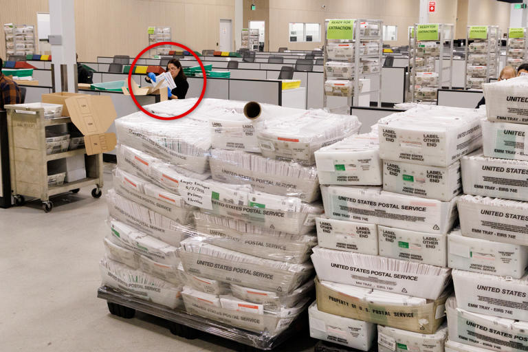 Inside LA County election vote-counting facility with rows of empty ...