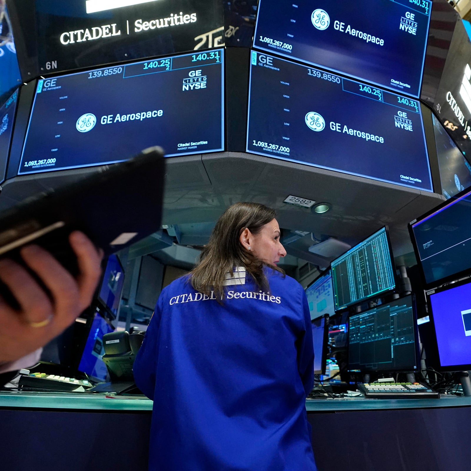 Dow soars nearly 900 points as Wall Street bets on Iran peace deal