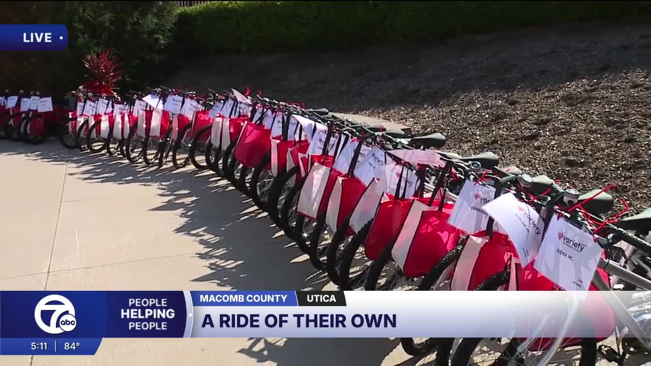 Variety Bike Night returns to UWM Field, presenting bikes to dozens of kids