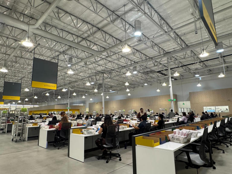Inside LA County election vote-counting facility with rows of empty ...