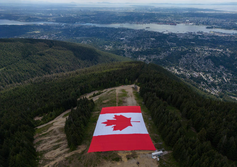 Biggest Canadian flag unfurled in Vancouver for World Cup, but may ...
