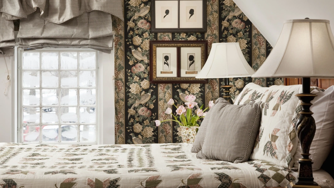 Statement lighting and calming layouts shape bedroom trends