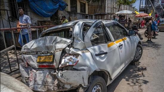 Driver cleaning his cab on highway edge run over after BEST bus loses ...