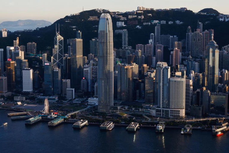 Hong Kong-listed shares of AIA, HSBC and StanChart fall as China ...