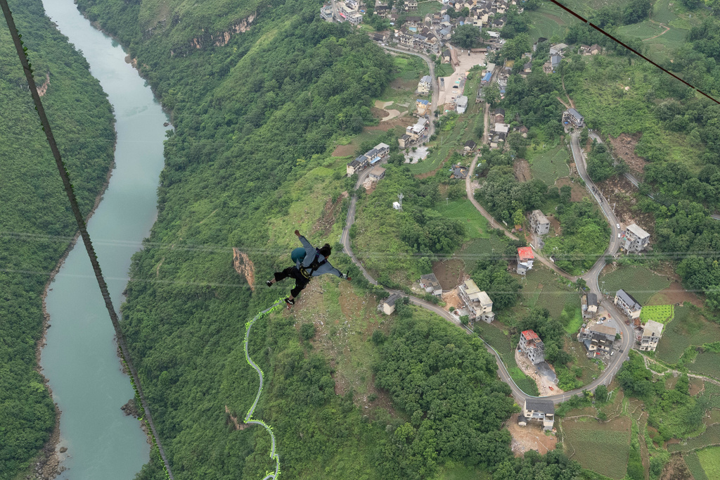 China’s highest bridge brings tourists and internet access to remote ...