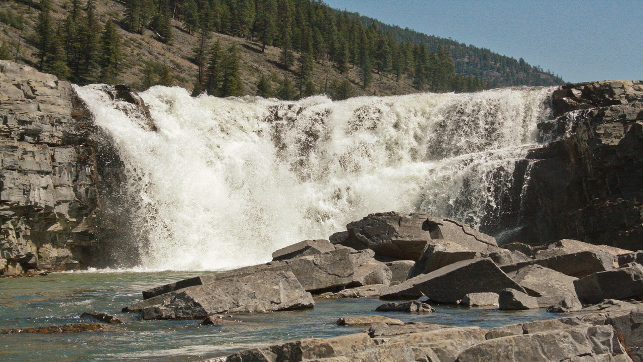 A swinging bridge, turquoise water, and a 90-foot plunge in Montana’s ...