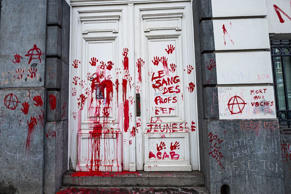 Hordes of hooded men set Brussels ablaze as violent riots rip through ...