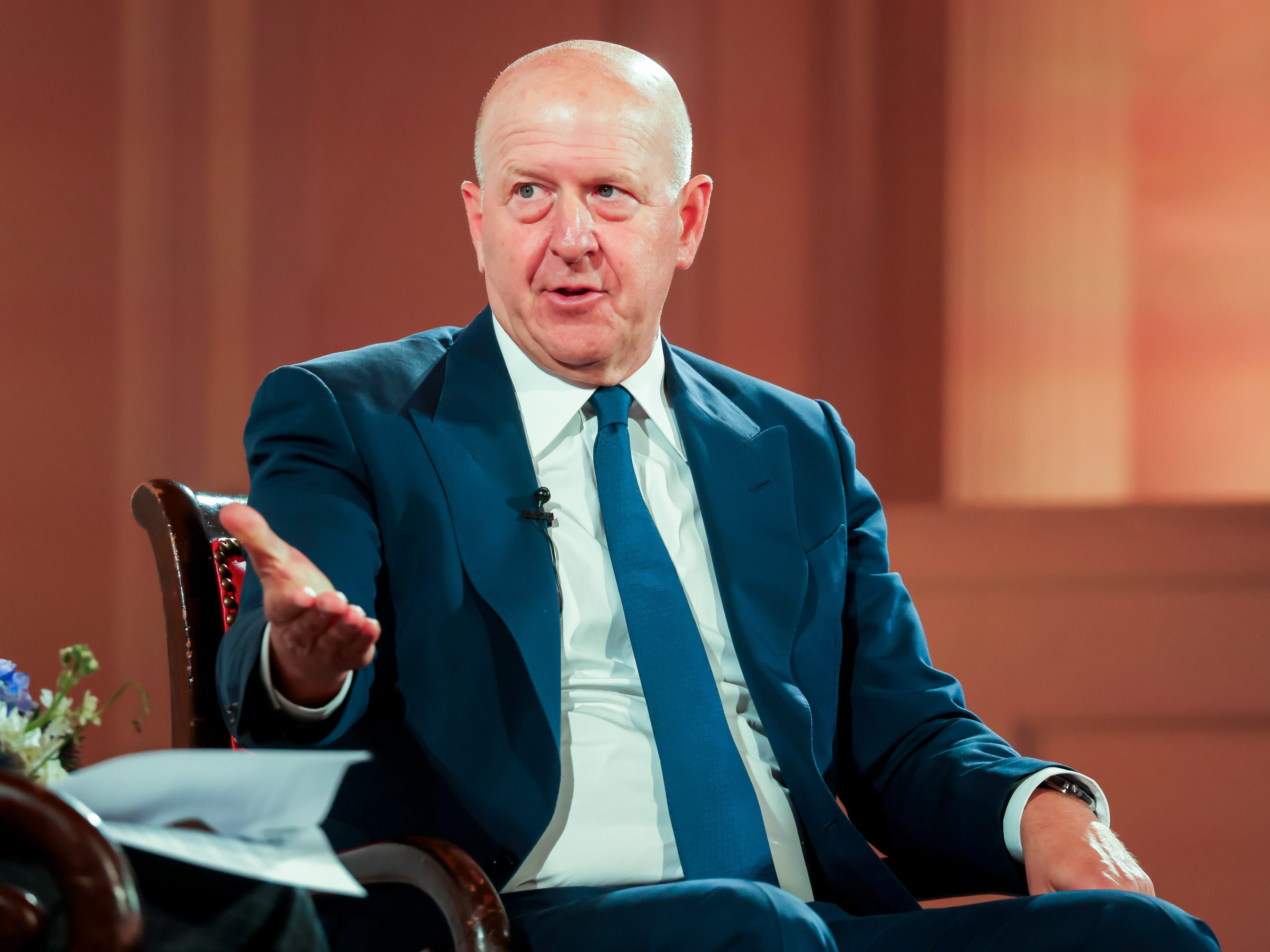 Goldman CEO says the bank's entry-level hiring may contract a little as ...