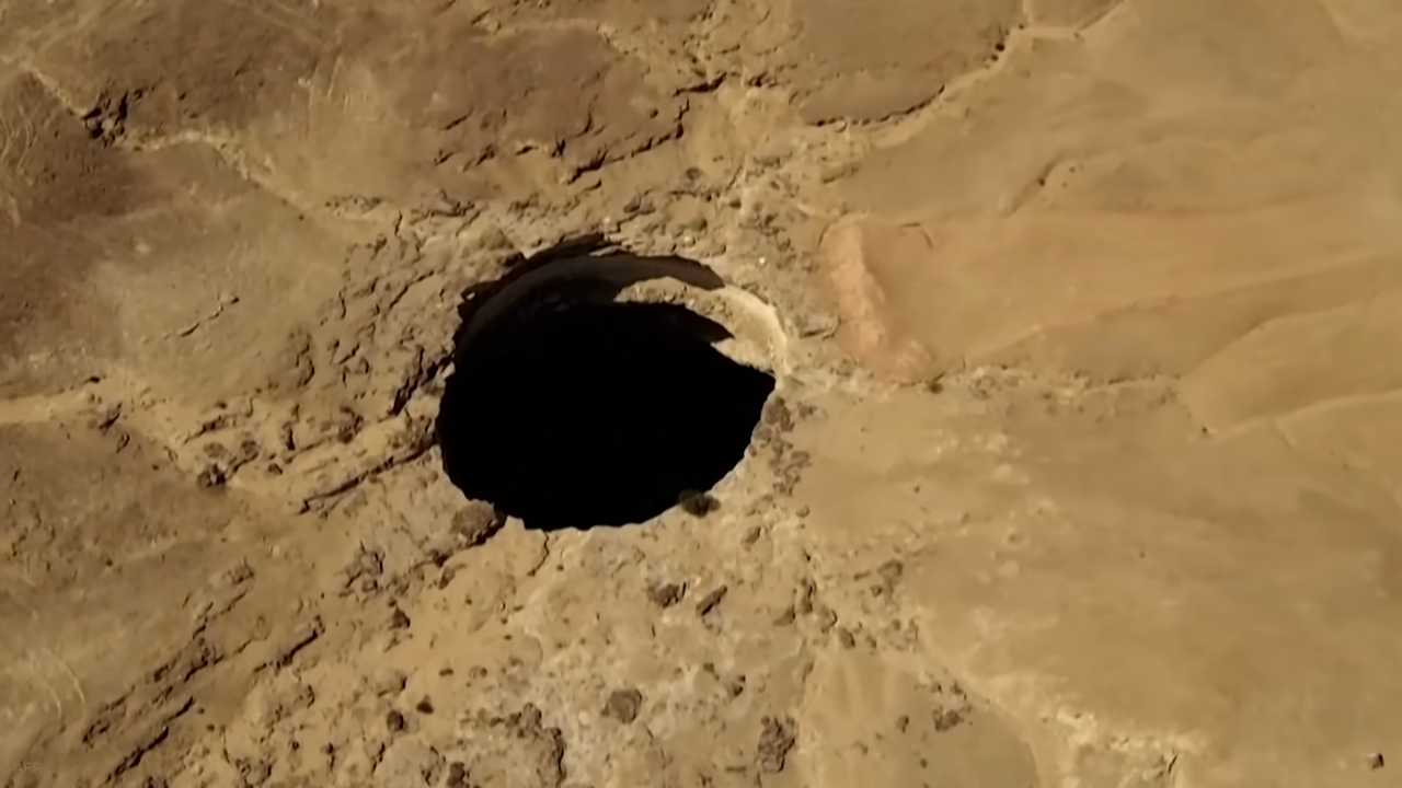 A satellite spotted a Siberian hole - then scientists found a 50,000 ...