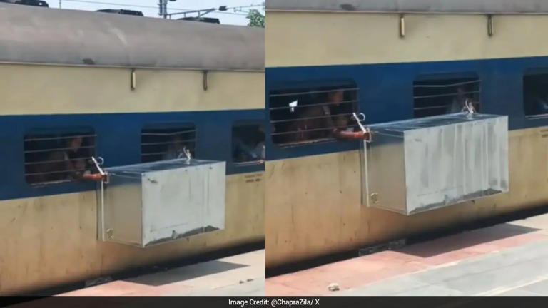 Passenger Holds Metal Trunk Out Of Moving Train Window, Railways Reacts