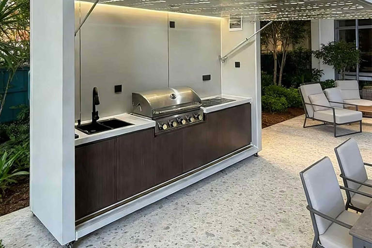 Amazon is selling an outdoor kitchen with a retractable roof, sink, and ...
