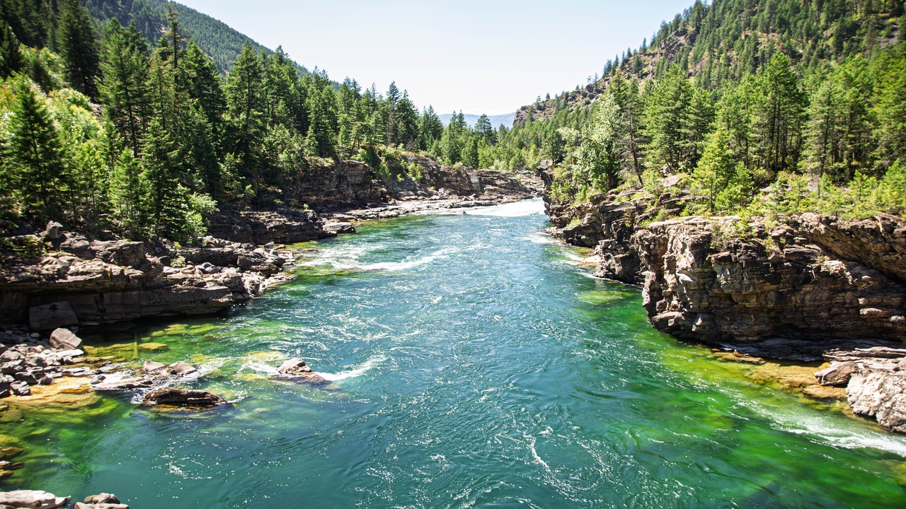 A swinging bridge, turquoise water, and a 90-foot plunge in Montana’s ...