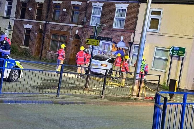 Horror as Tesla ploughs into UK house in late-night smash as rubble ...