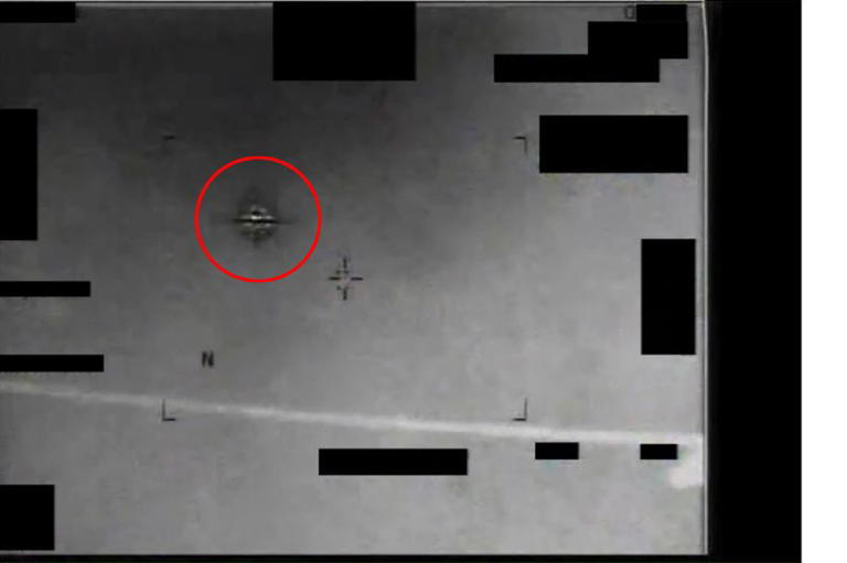 Top US exorcist axed after warning 'glowing orbs and shadow men' UFOs ...