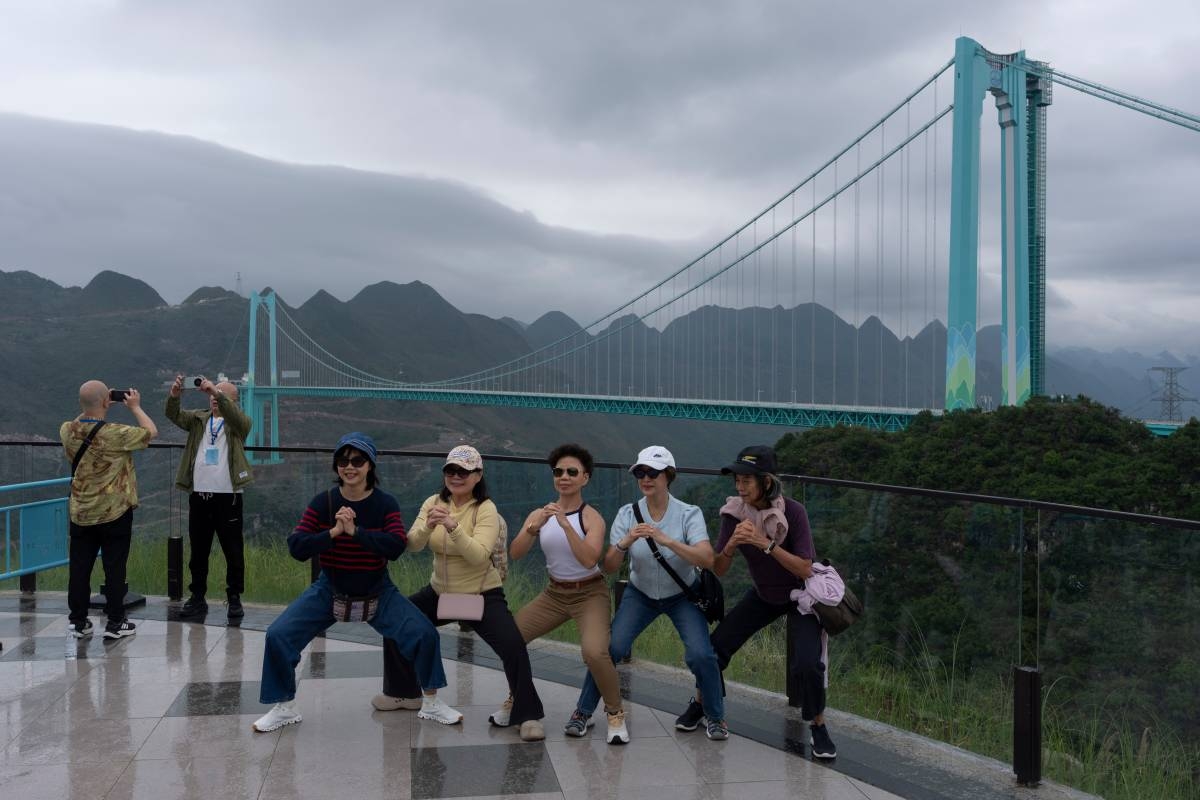 China’s highest bridge brings tourists and internet access to remote ...