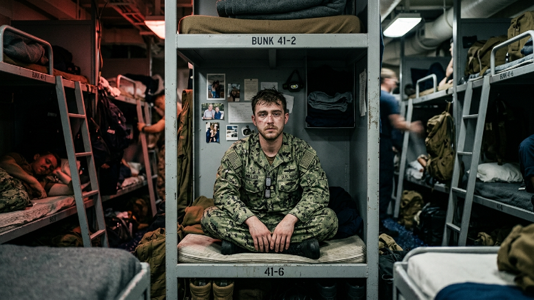The brutal reality of 5,000 sailors living inside a floating city
