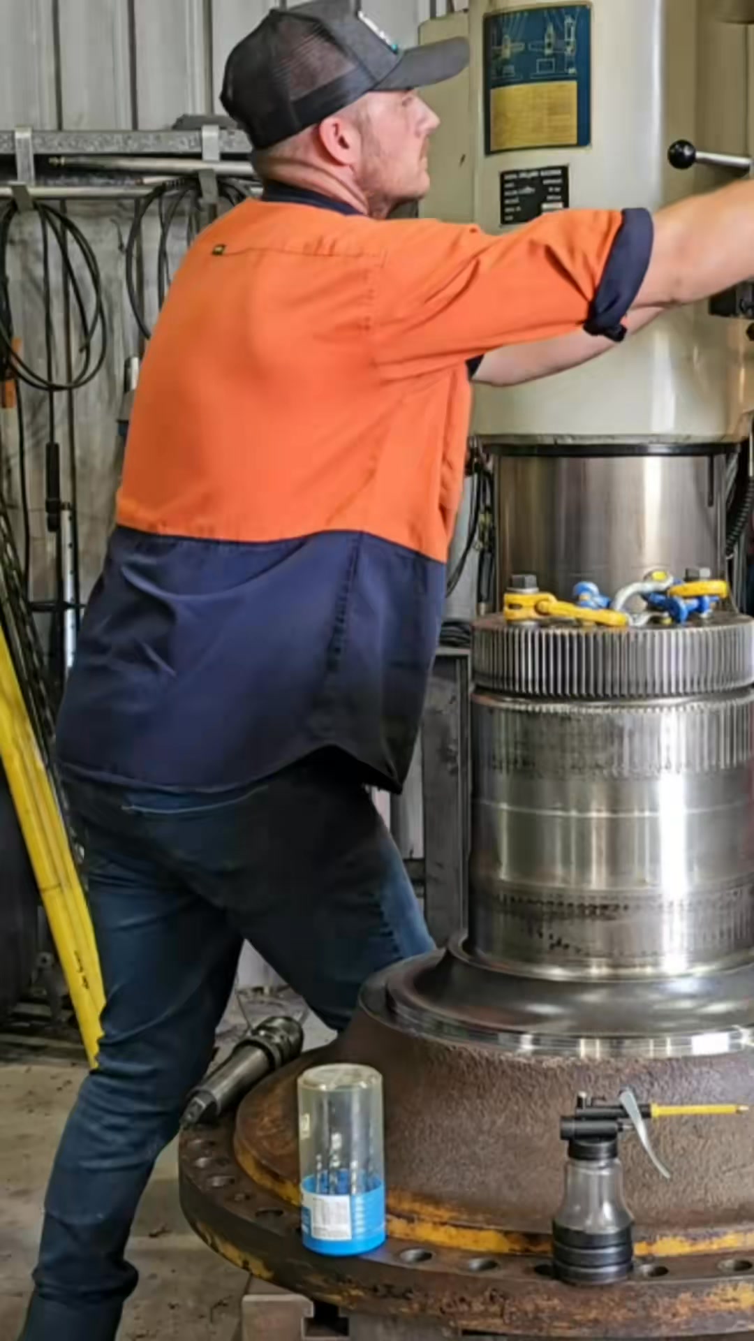 Drilling and tapping a dozer spindle