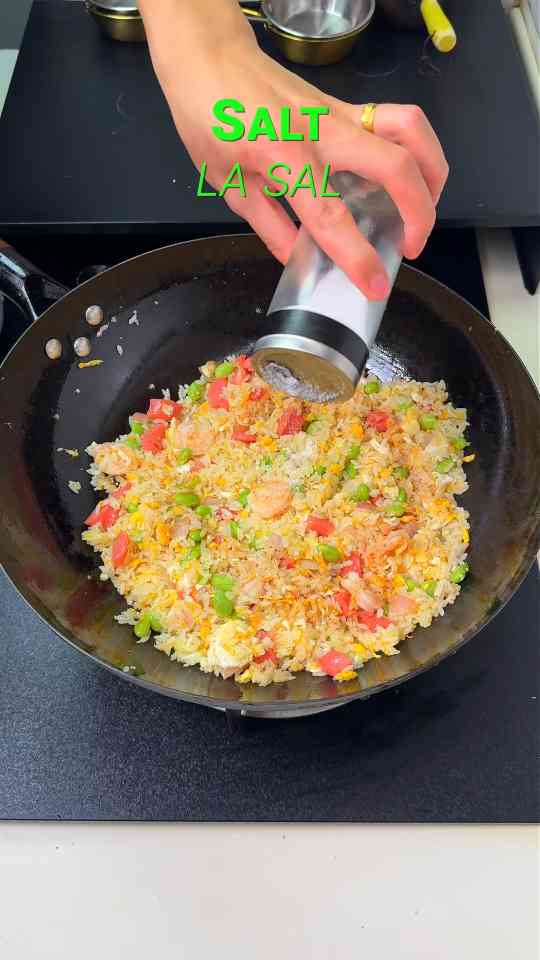 Flavorful Chinese fried rice with sausage and onions