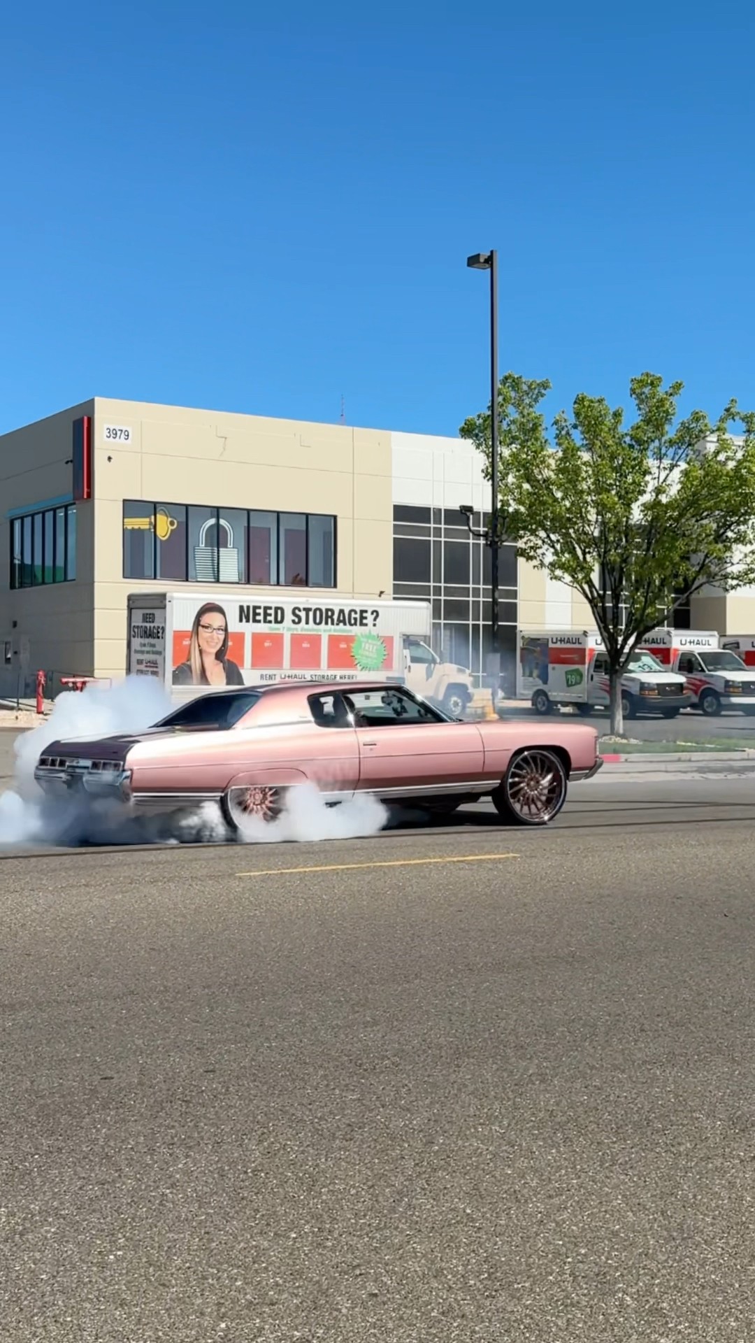 Turbo donk spins 26s across the street