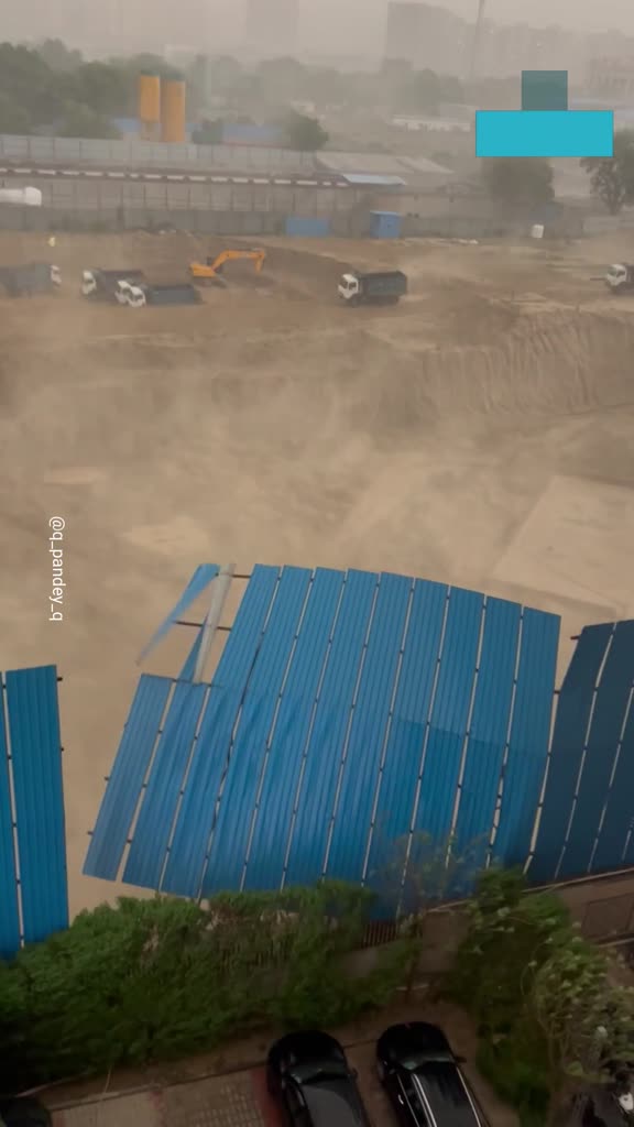 Violent hailstorm sends metal sheets flying through air