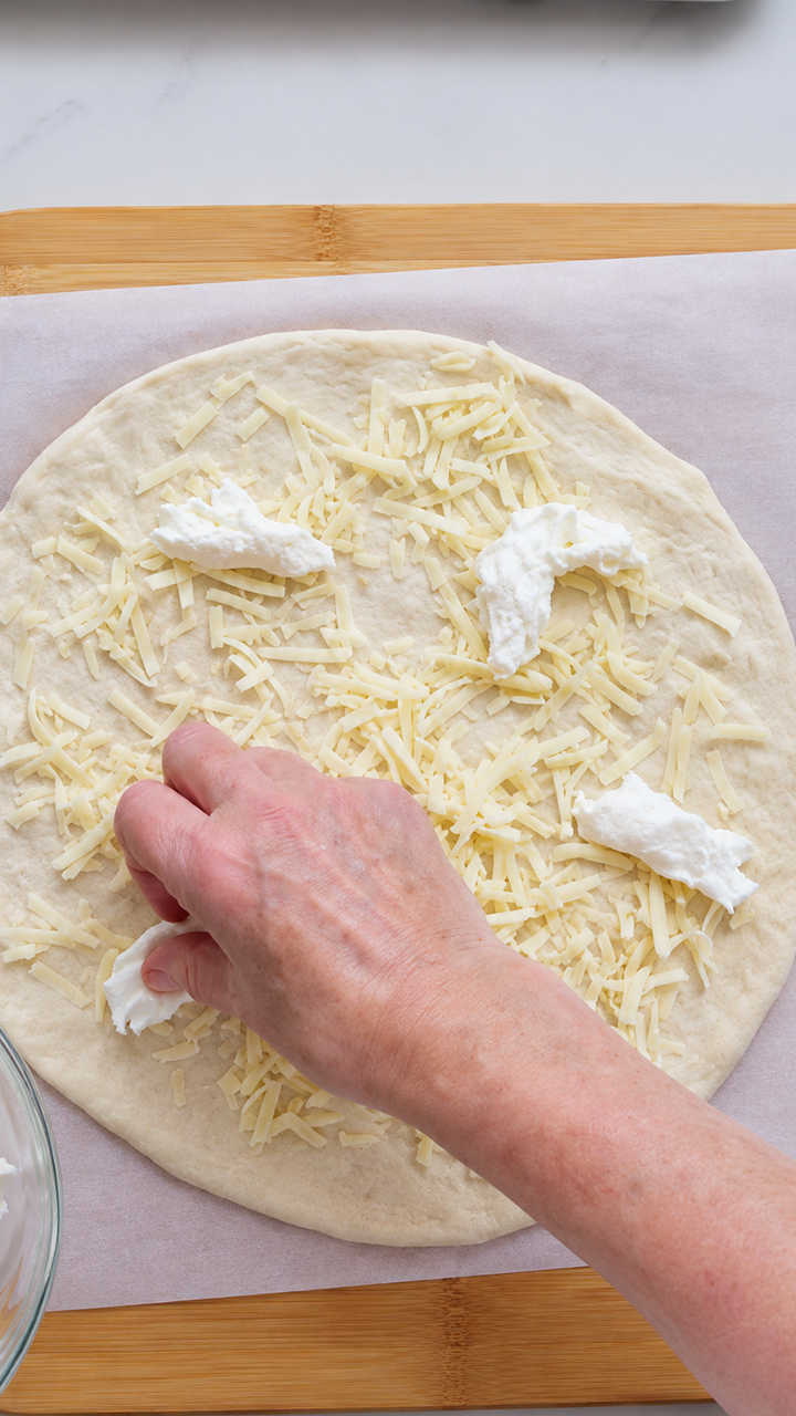 Savory spinach pizza recipe with mozzarella and cheddar