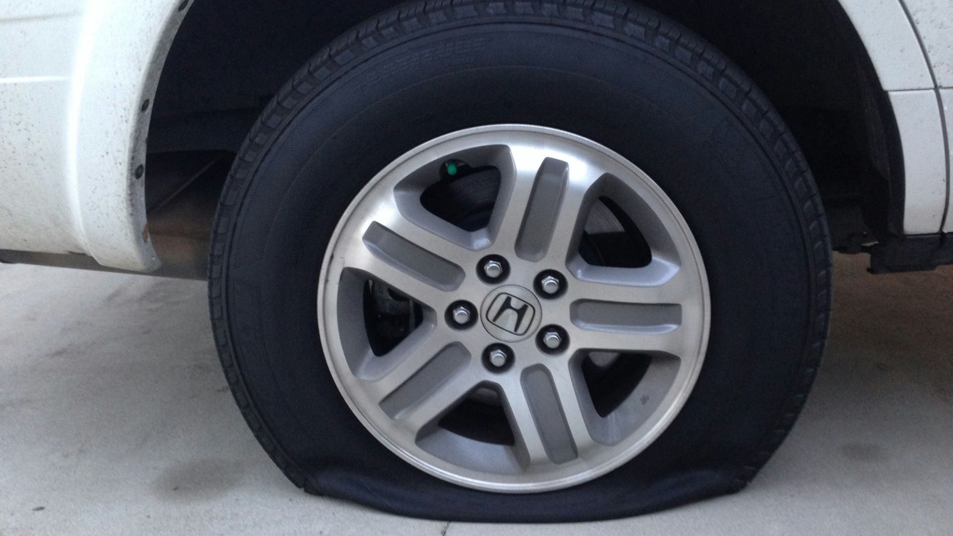 A nail punctured my tire and the garage says I need a brand-new tire ...