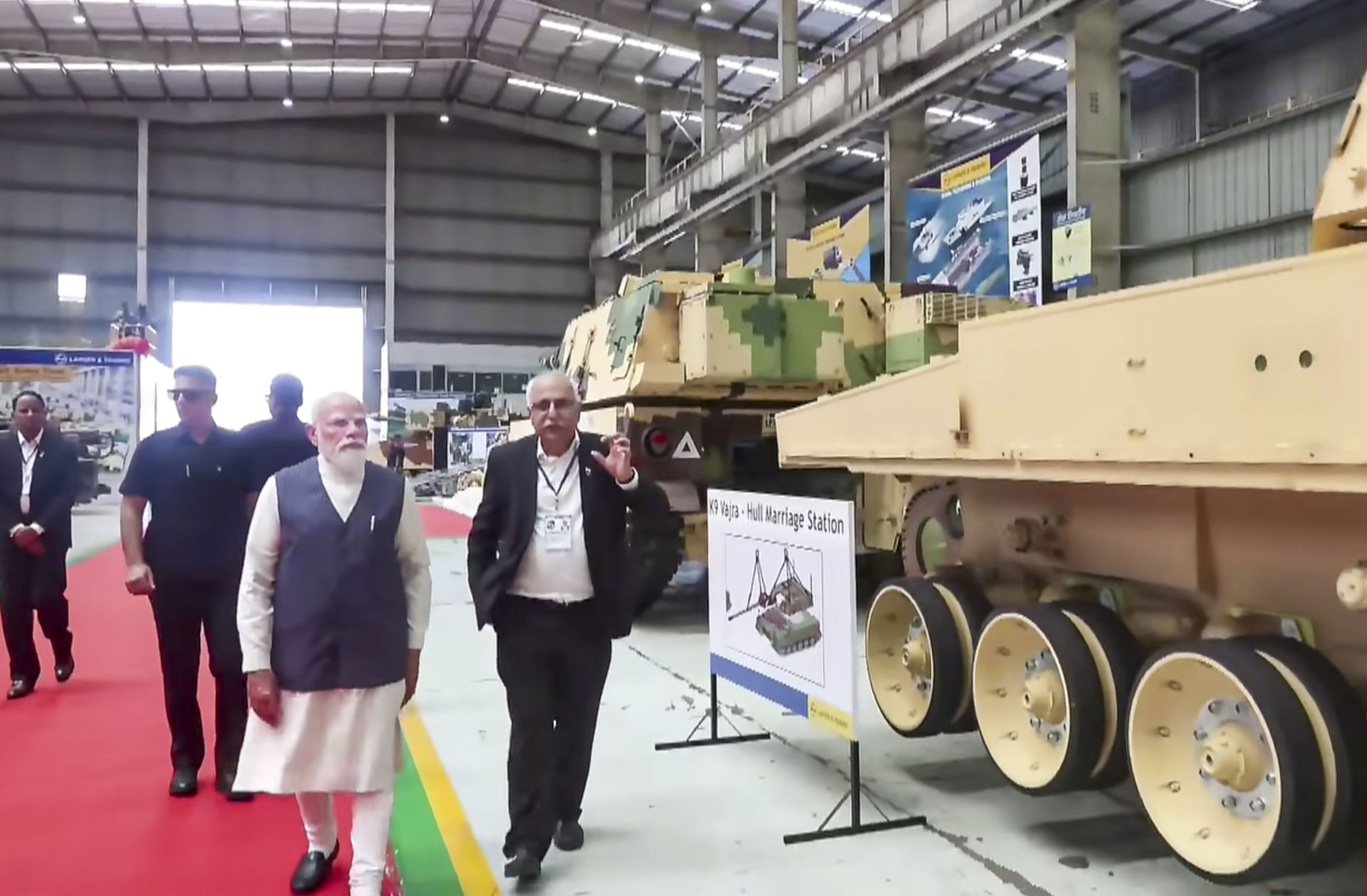 PM Modi visits L and T's Hazira facility in Gujarat's Surat, reviews ...