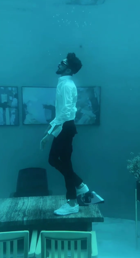 A hauntingly beautiful underwater performance that captures the weight ...