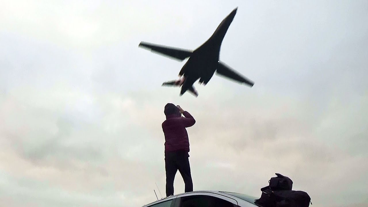 Watch the B-1 Lancer come in low - then the flyby turns heart-stopping