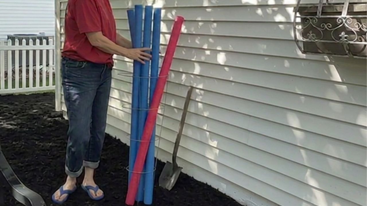 Stick a pool noodle into a tomato cage for this brilliant outdoor hack